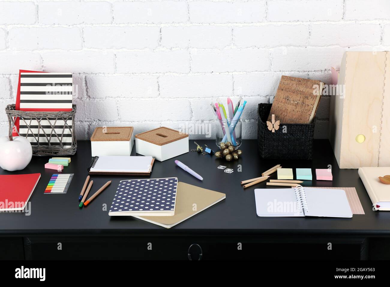 Office and school set with stationery and notebooks on a table Stock ...