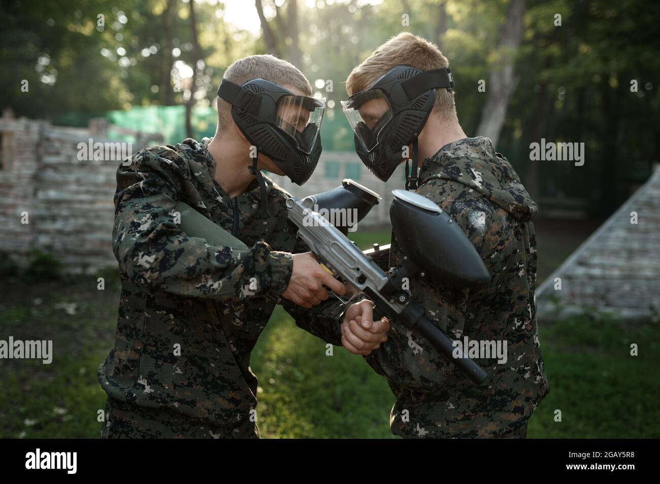 Two paintball players poses on playground Stock Photo - Alamy