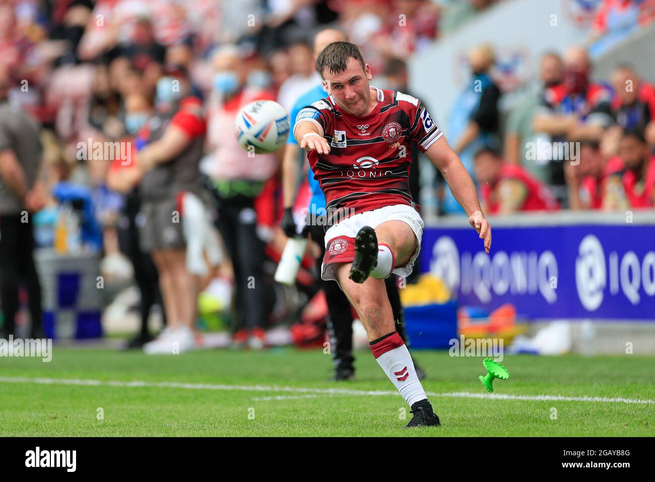 Harry Smith (20) of Wigan Warriors kicks a conversion Stock Photo - Alamy