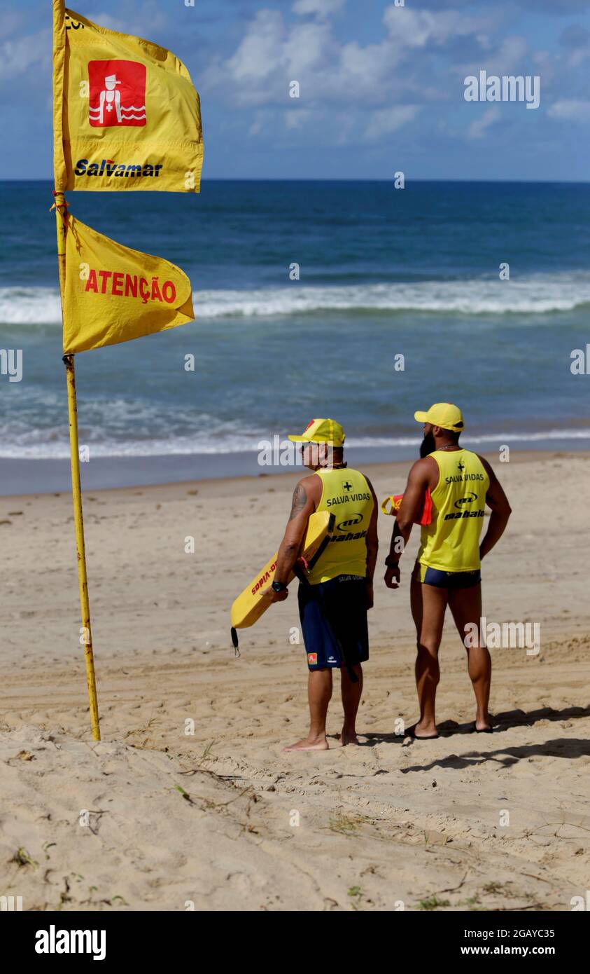 salvador, bahia, brazil - june 26, 2019: Lifeguards observe ocean waves ...