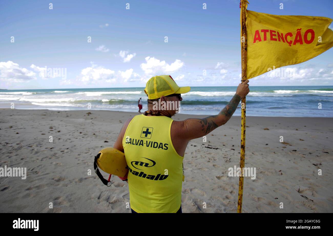 salvador, bahia, brazil - june 26, 2019: Lifeguards observe ocean waves ...