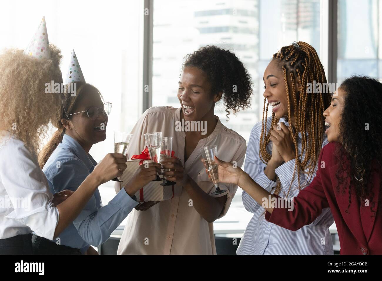 Happy african american colleagues celebrating birthday Stock Photo - Alamy