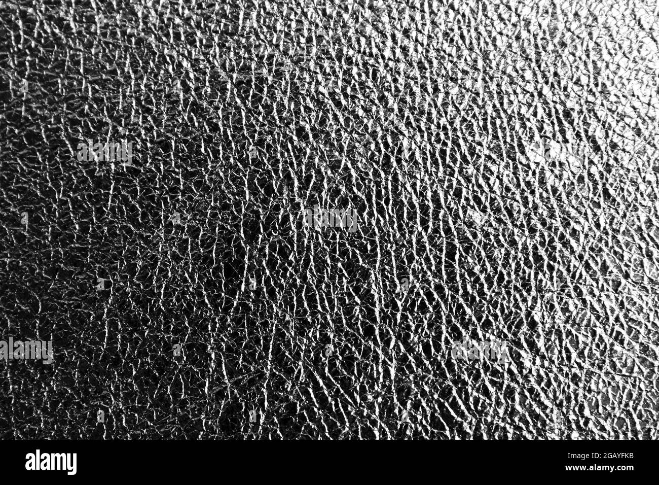 Dark brown shiny leather texture close up Stock Photo - Alamy