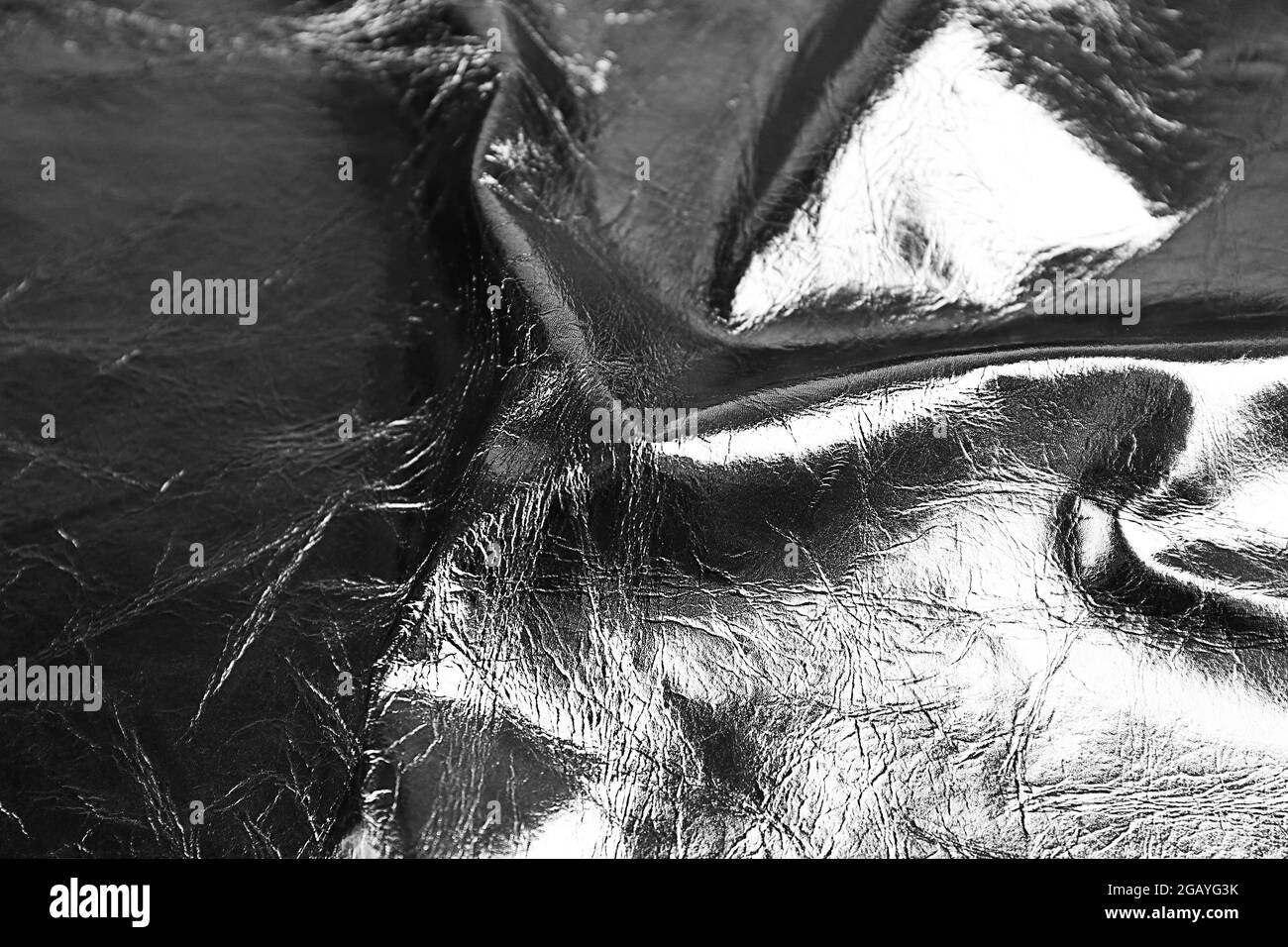 Black shiny leather texture close up Stock Photo - Alamy
