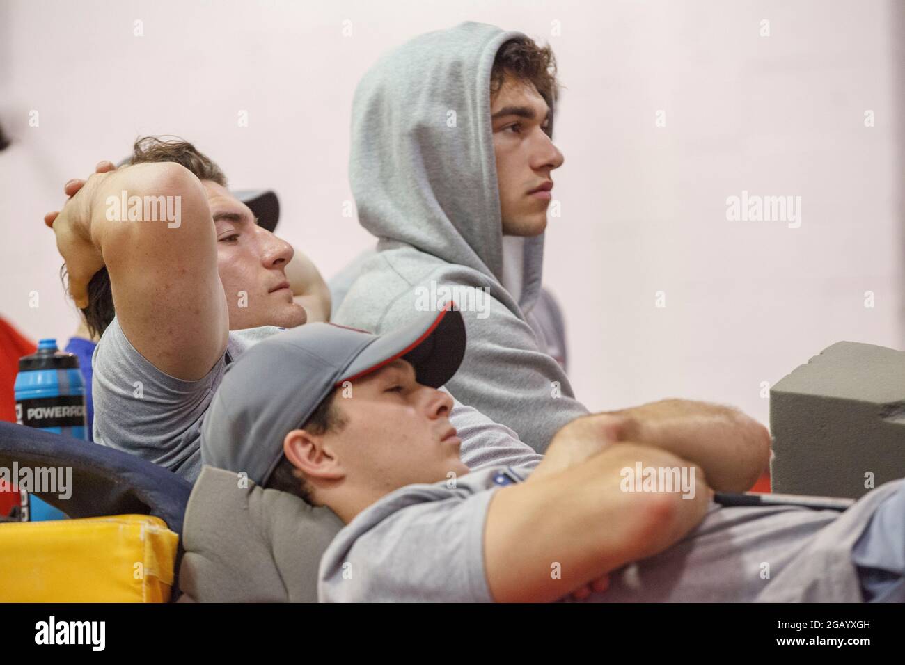 Three of Men’s Gymnastics team seen as they watch the Men’s Pommel ...