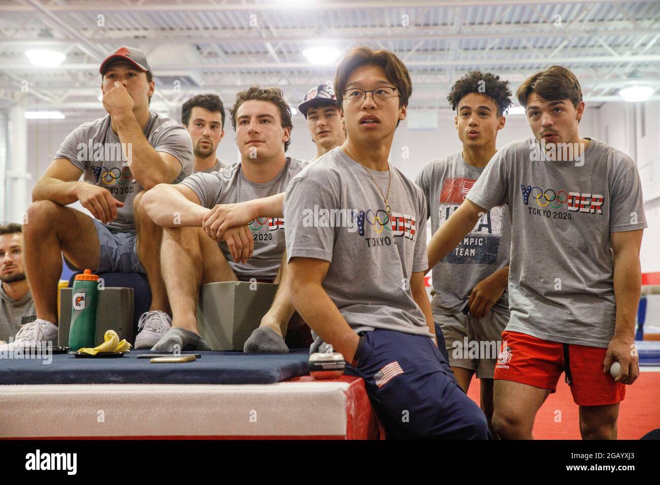 Men’s Gymnastics team reacts as they watch the Men’s Pommel Horse ...