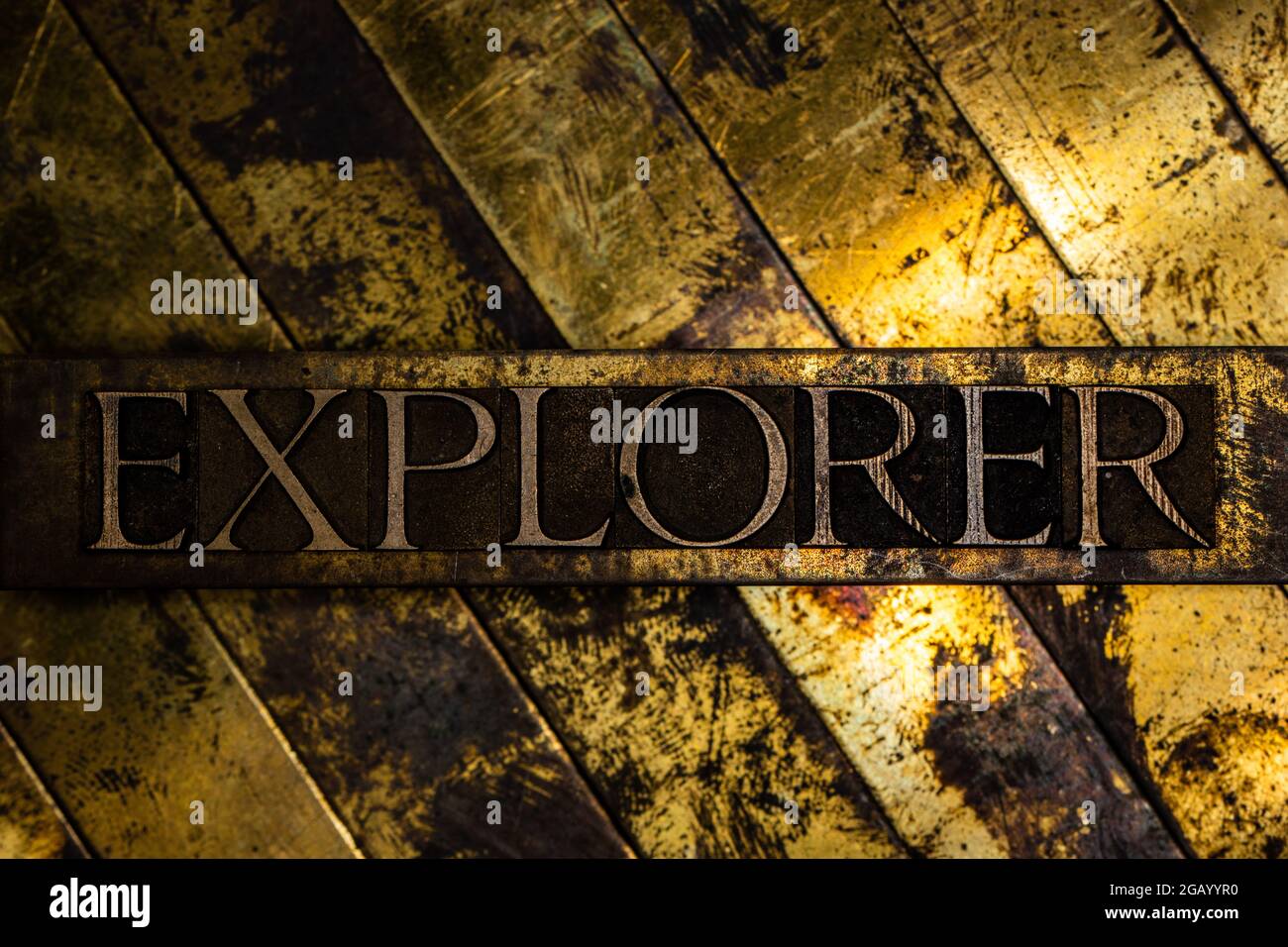 Explorer text on textured lead with grunge copper and vintage gold ...