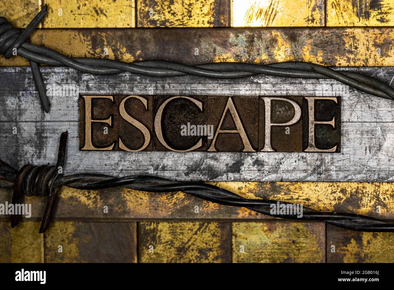 Escape text between barbed wire on vintage textured grunge lead copper ...