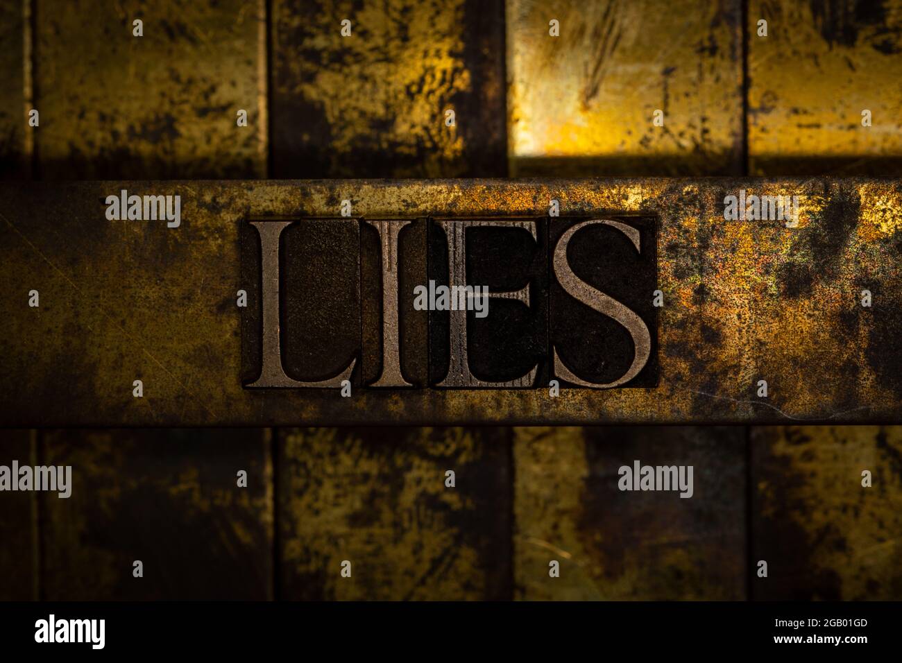 Lies text on vintage textured grunge copper and gold background Stock ...