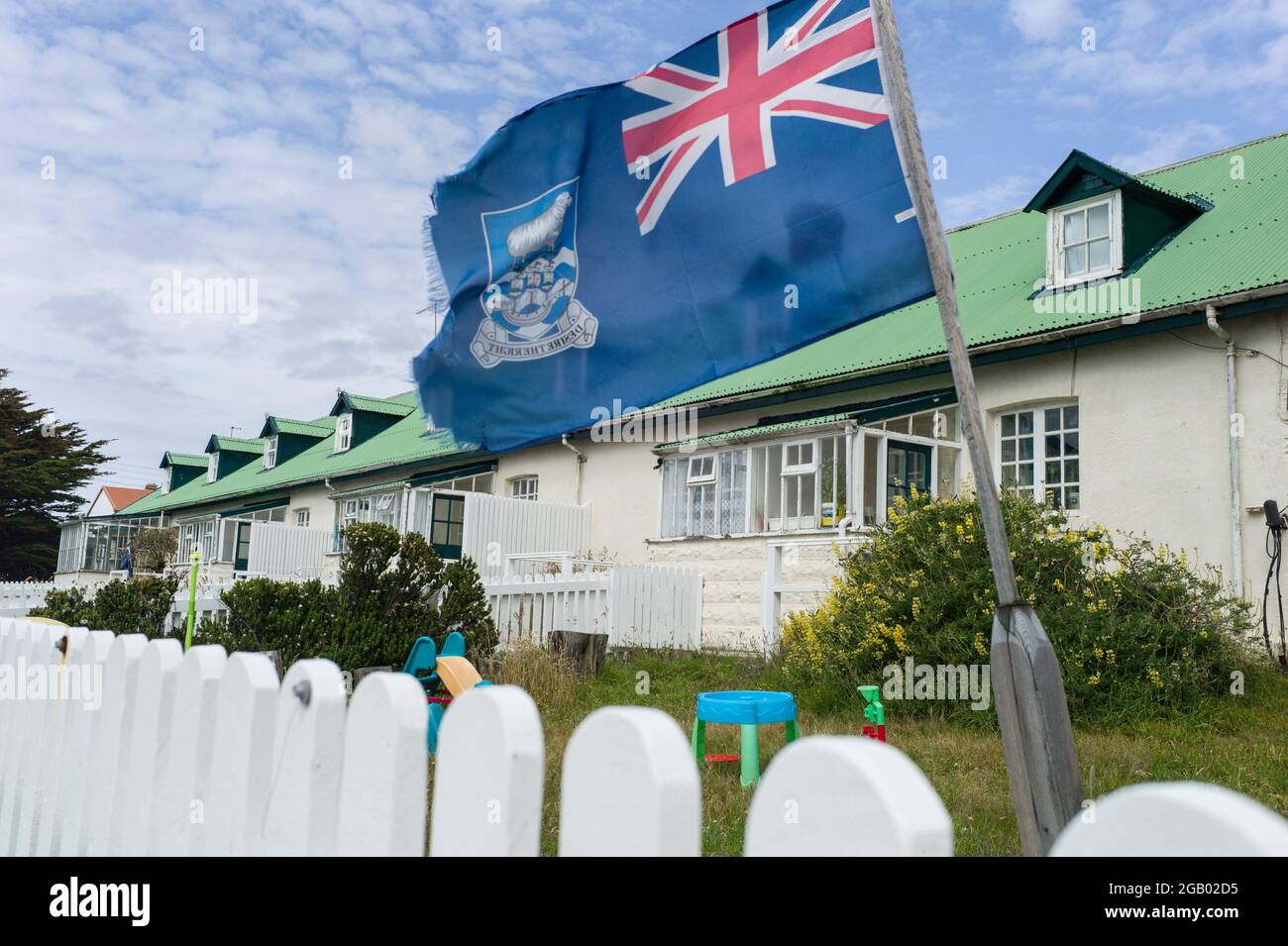 Houses on port stanley main street with the falkland island flag flying ...