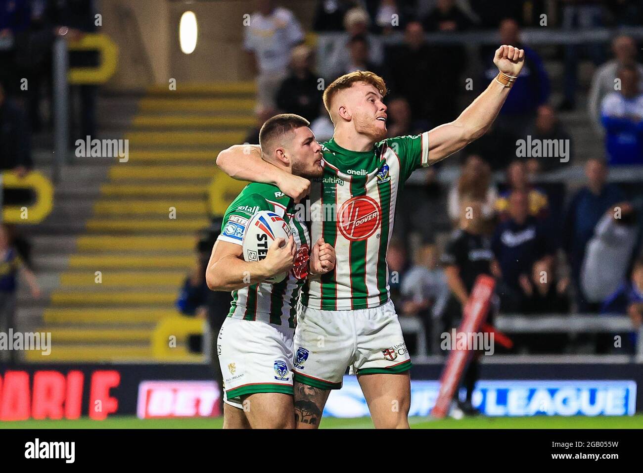 Danny Walker (16) of Warrington Wolves celebrates his try Stock Photo ...