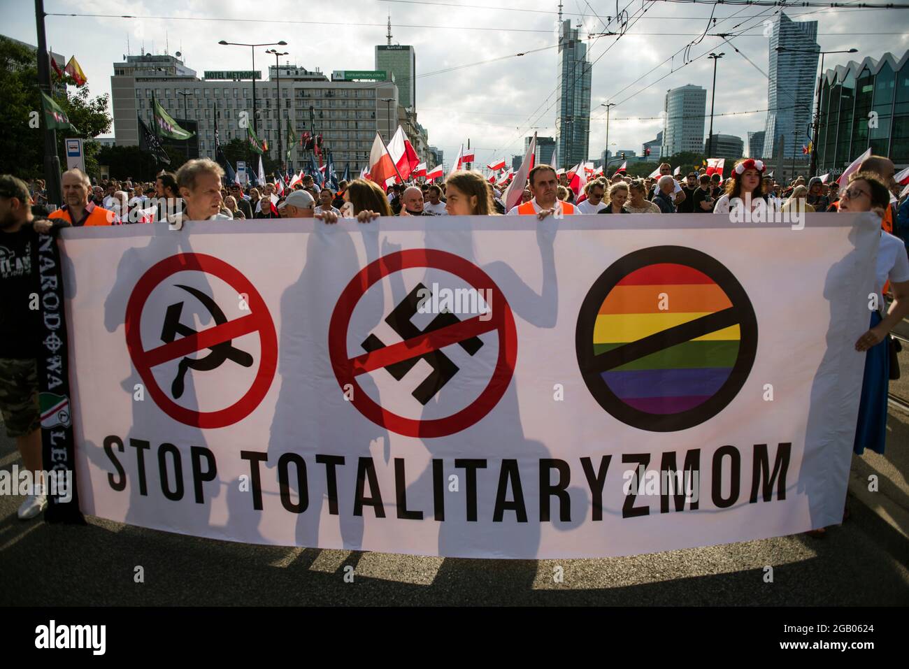 Warsaw, Poland. 01st Aug, 2021. People hold a banner during the march ...