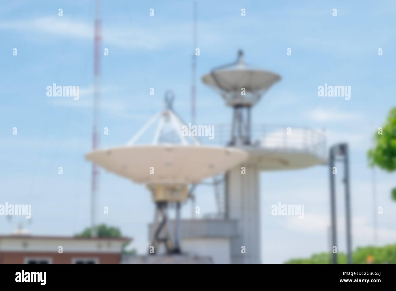 Blurred background satellite dish signal station Stock Photo - Alamy