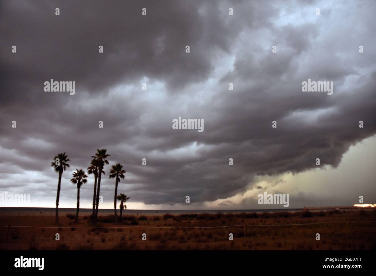 Large clouds float over the maritime neighbourhood of Coma-ruga before ...