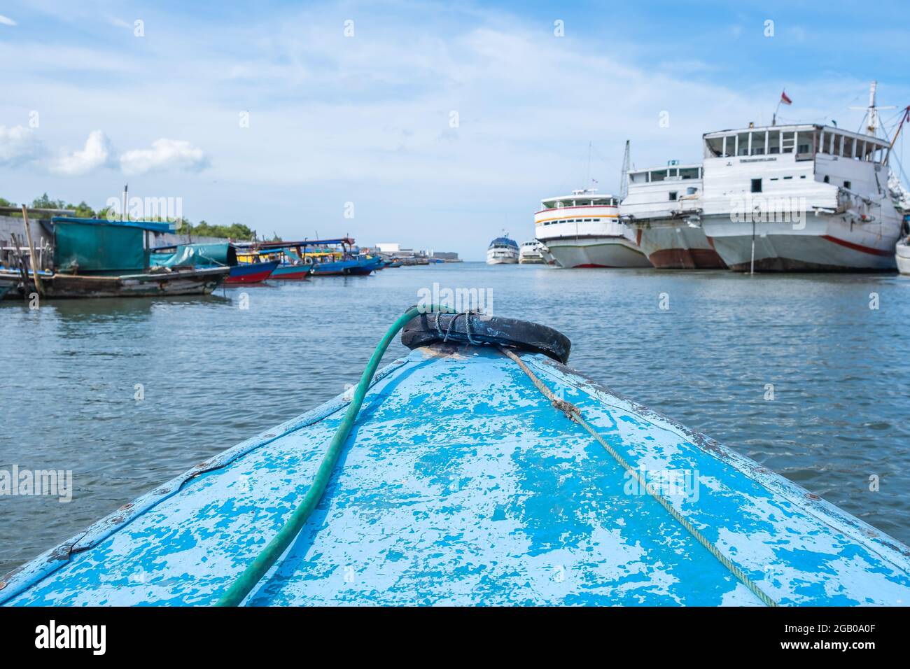 Boating with small wooden ship along in Sunda Kelapa Port, Jakarta for ...