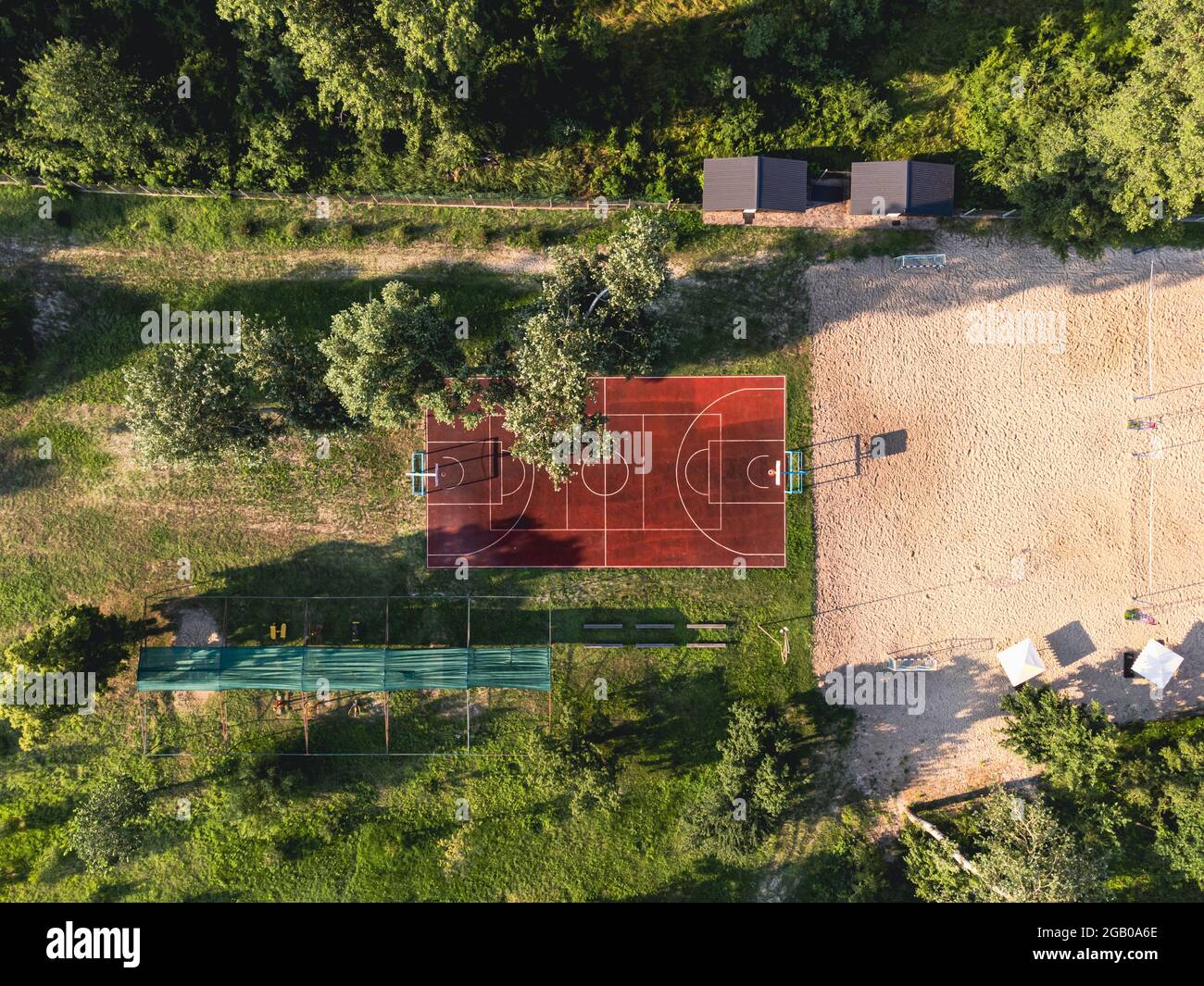 Aerial View of basketball court in a nature environment. Sunset summer ...