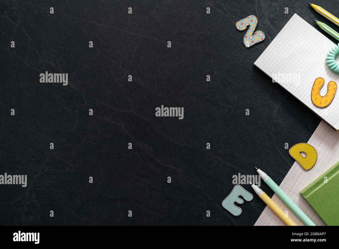 Study, education, learning at school concept on black background with ...