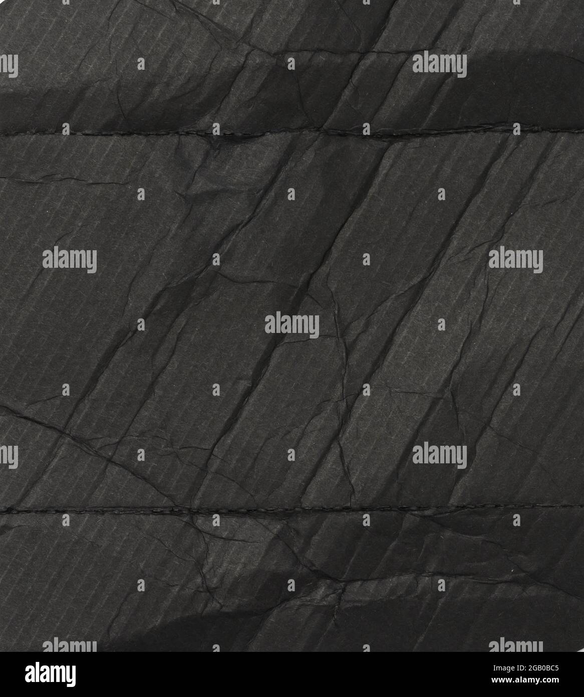 black cardboard texture with folds, full frame, inside of perfume box ...