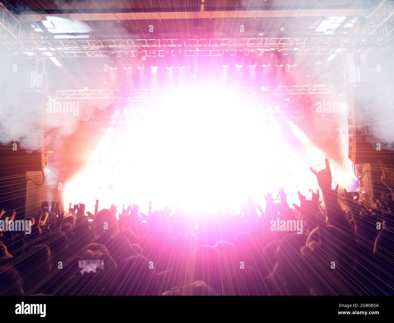Colourful gig with a lit stage and festive crowd Stock Photo - Alamy