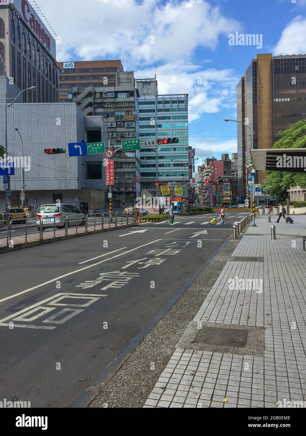 Taipei, Taiwan - July 6, 2015: View of road traffic and buidings in the ...