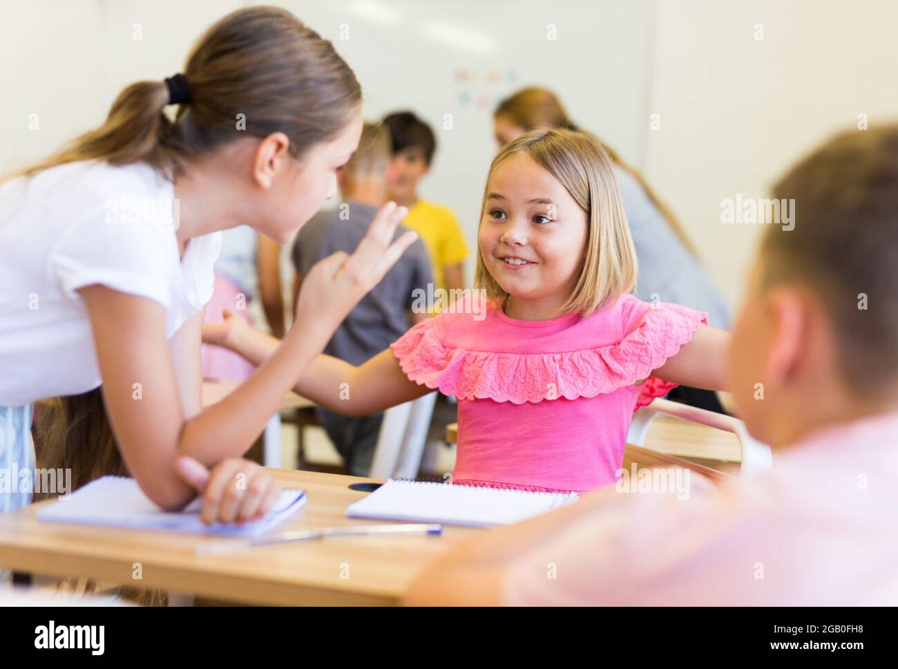 Schoolchildren performing team tasks Stock Photo - Alamy