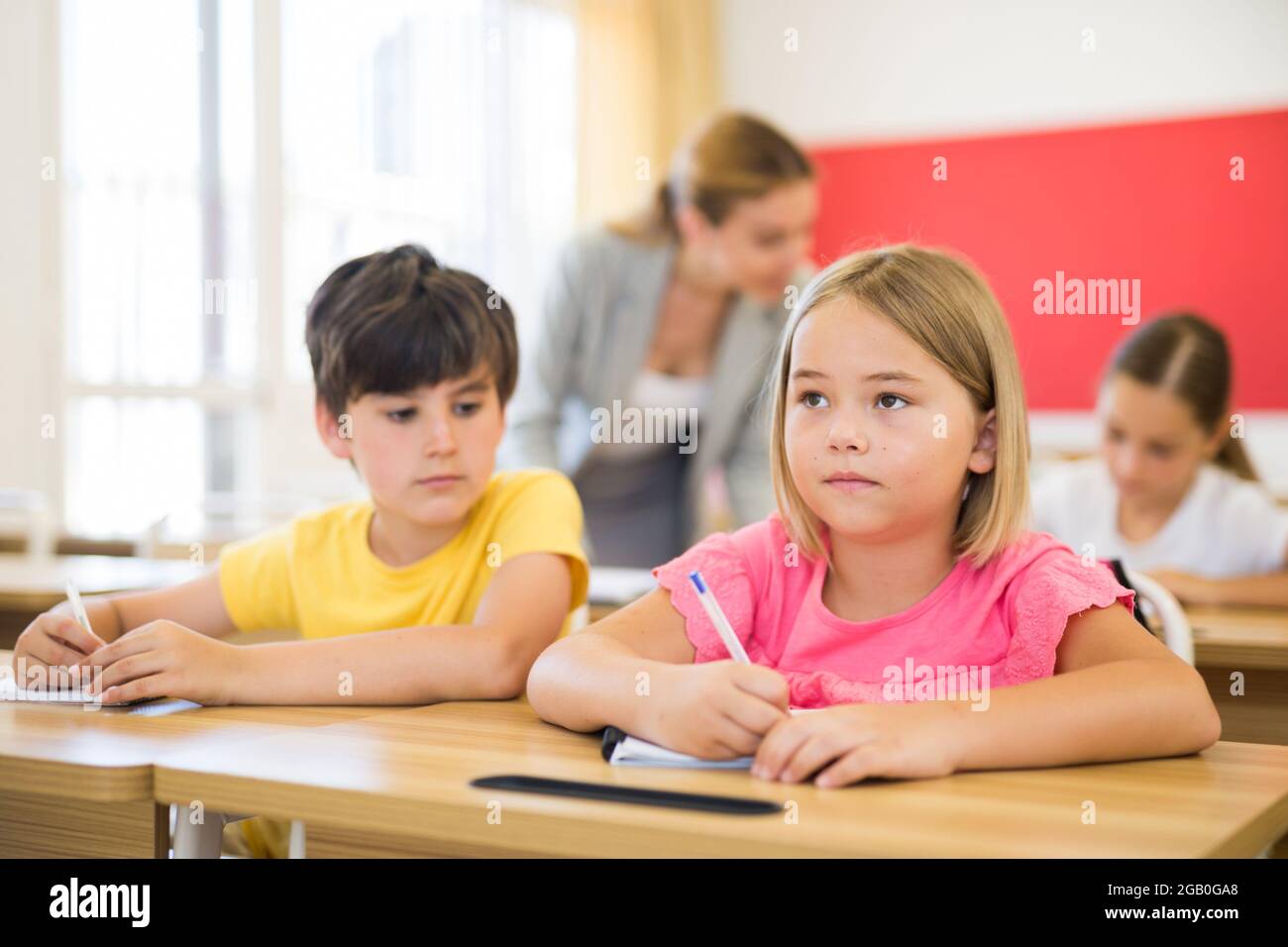 Schoolchildren performing test Stock Photo - Alamy