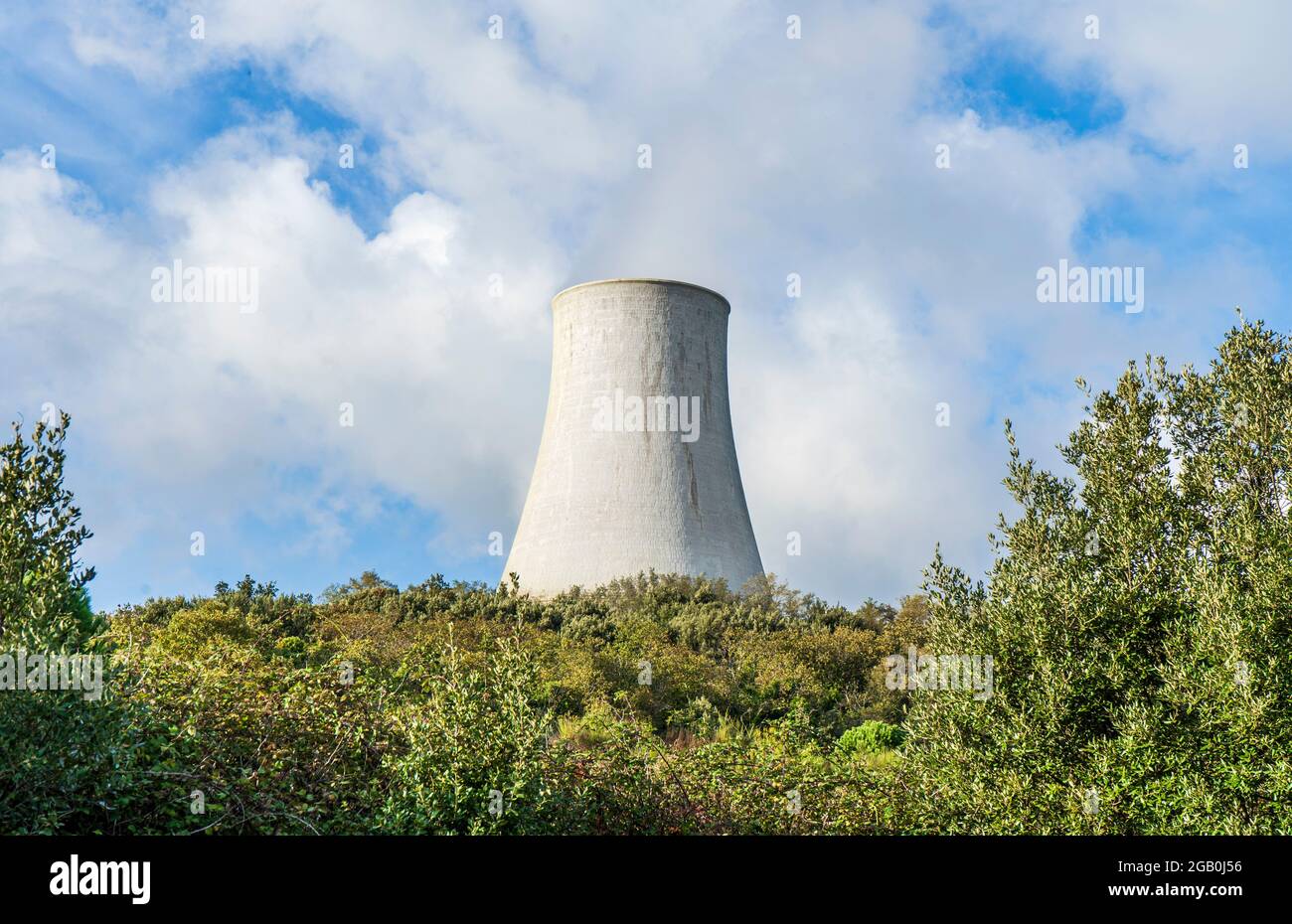 A cooling tower of a geothermal power plant in Monterotondo Marittimo ...