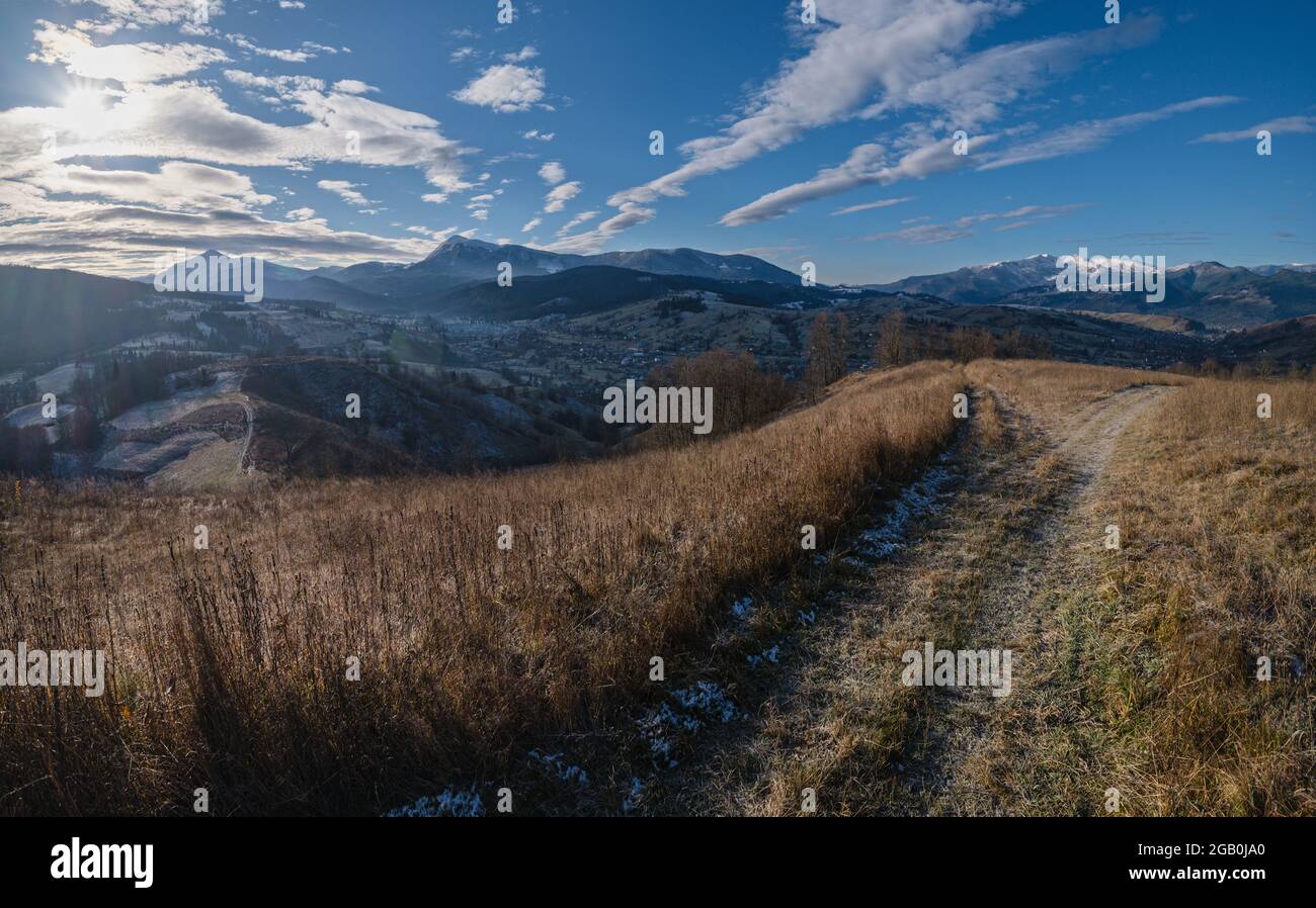 Winter coming. Last good weather days in autumn mountain countryside ...