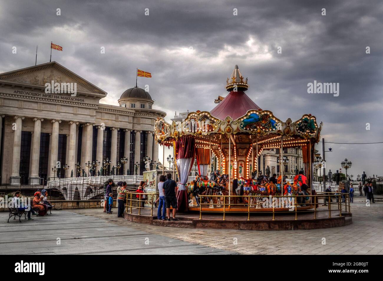 Carousel spin children who enjoy speed Stock Photo - Alamy
