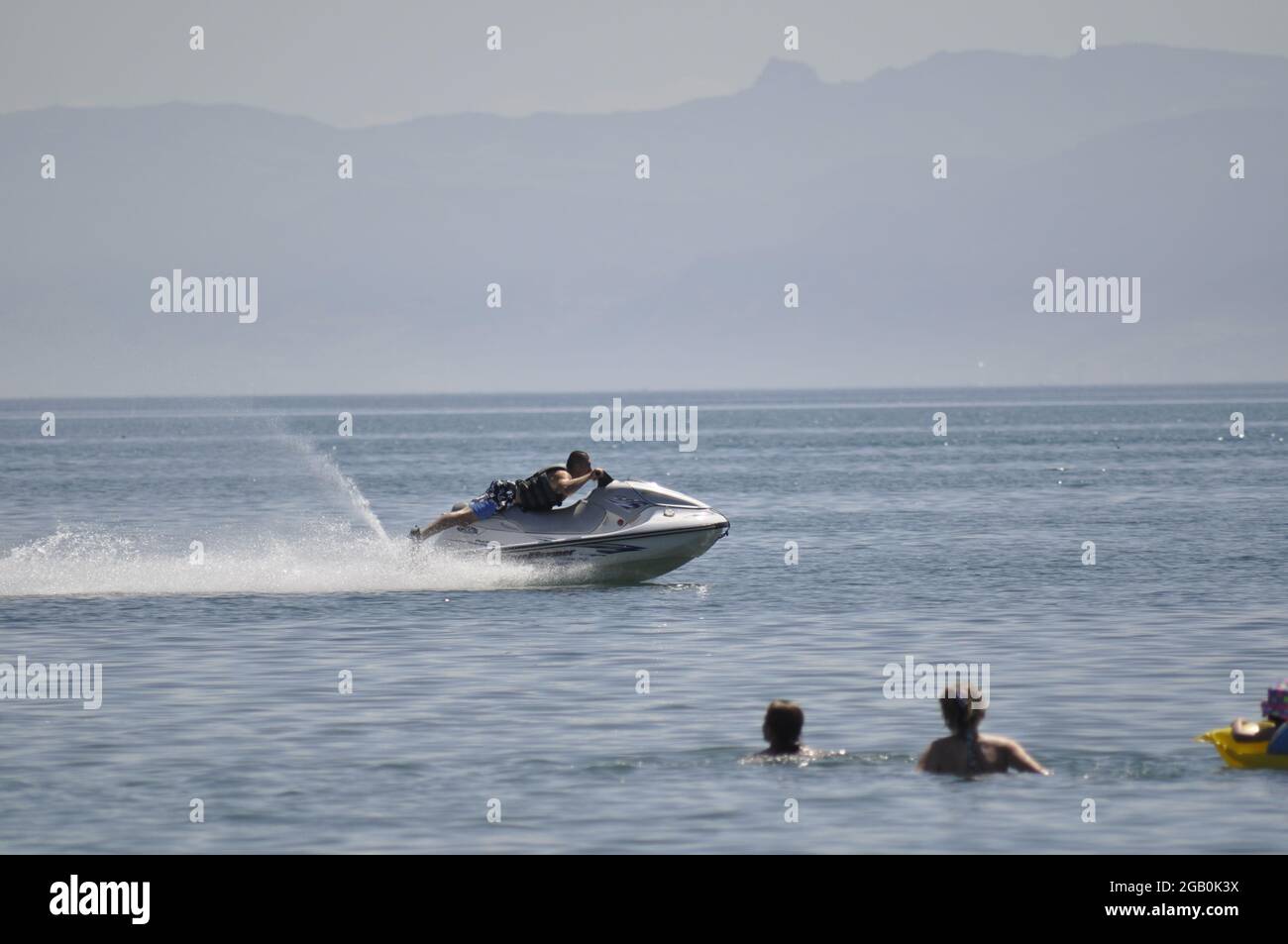 Speedboats drive fast through the water Stock Photo - Alamy