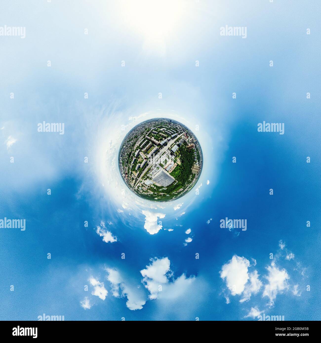 Aerial city view with crossroads and roads, houses, buildings, parks ...