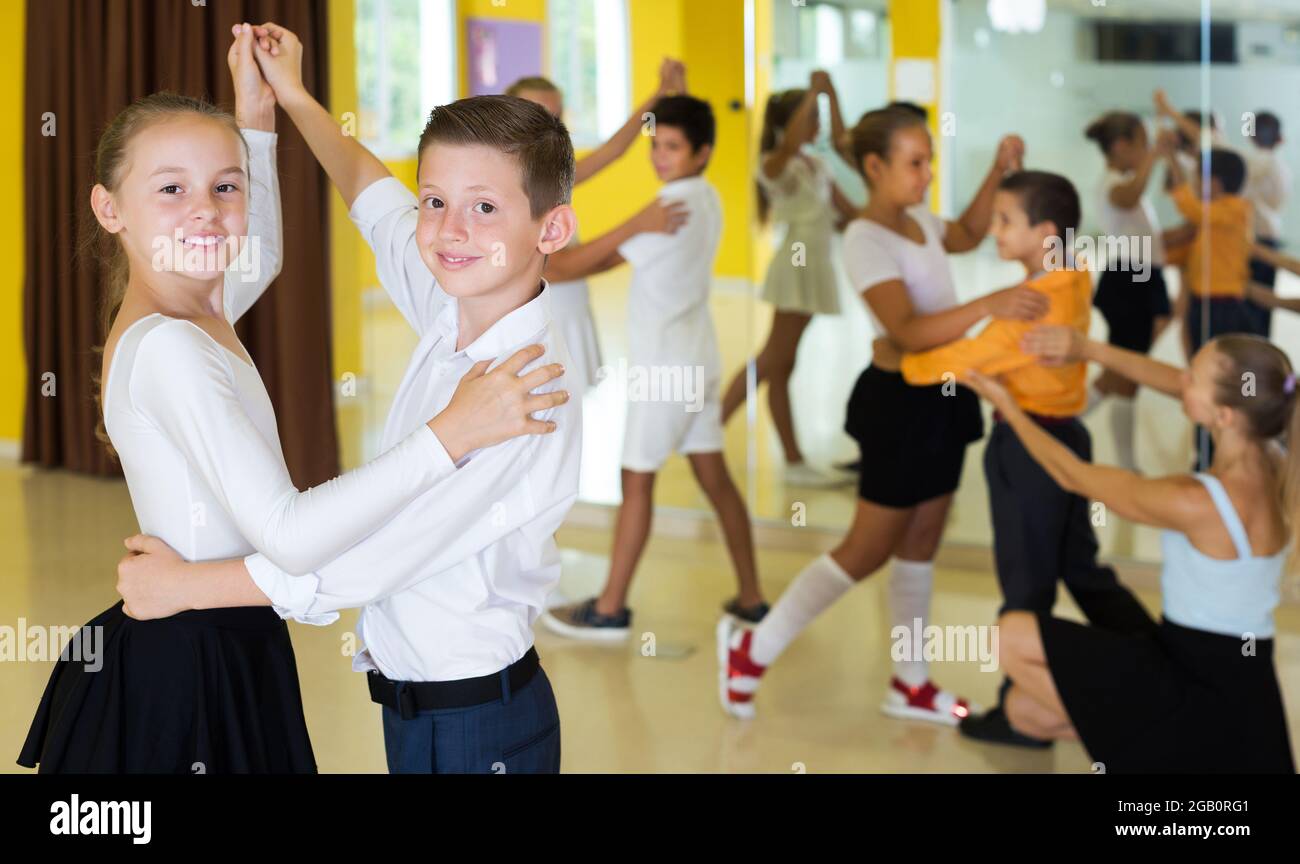 Children enjoying of partner dance Stock Photo - Alamy