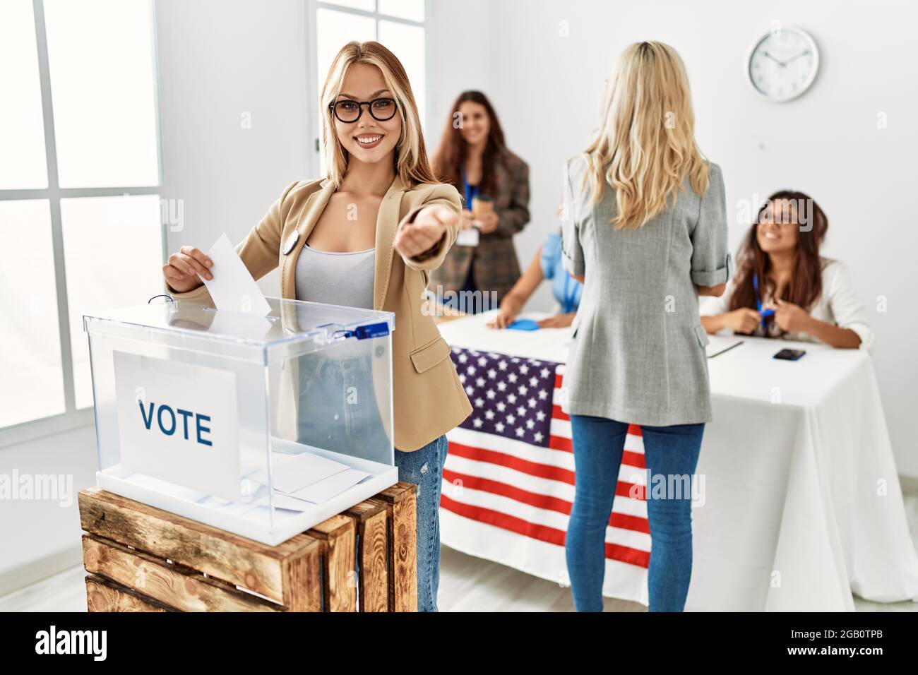 Group of young girls voting at democracy referendum smiling cheerful ...