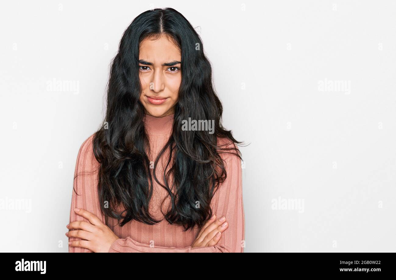 Hispanic teenager girl with dental braces wearing casual clothes ...