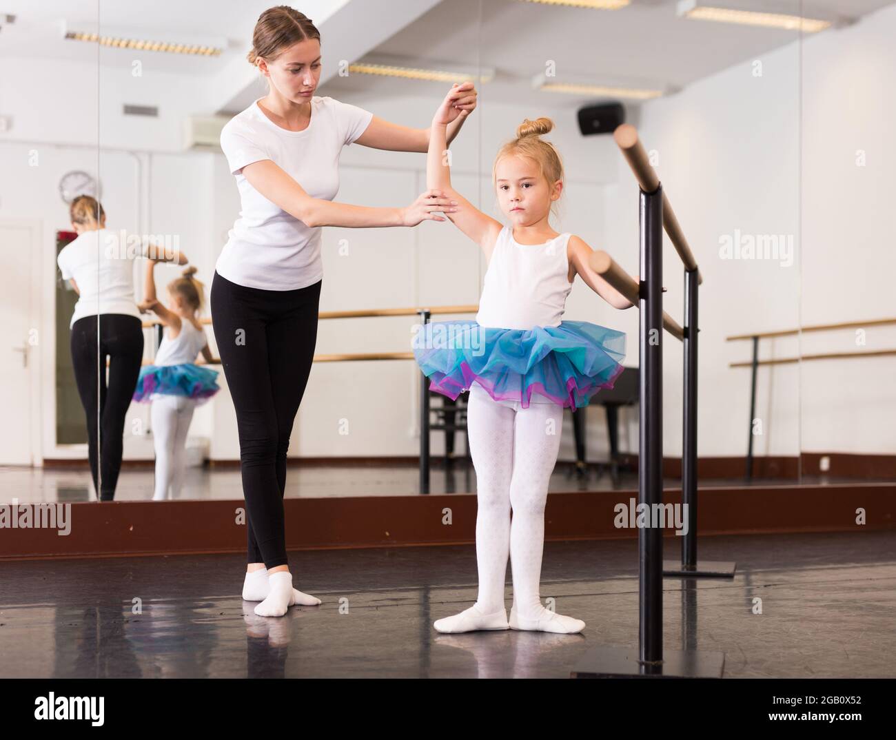 Choreographer and little girl Stock Photo - Alamy