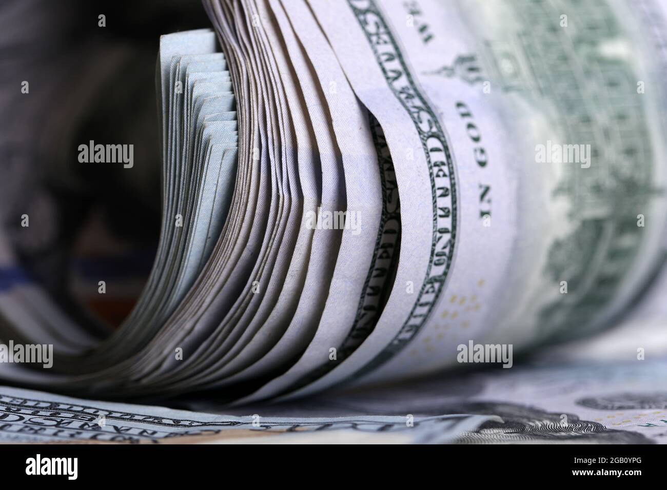 Twisted dollar banknotes, close up Stock Photo - Alamy