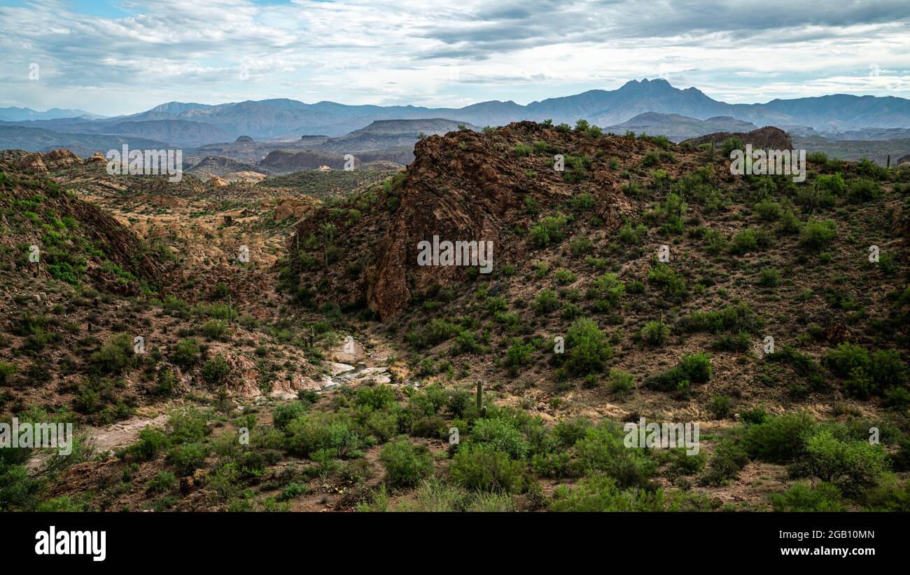 Scenic valley between mountains in the Arizona desert Stock Photo - Alamy