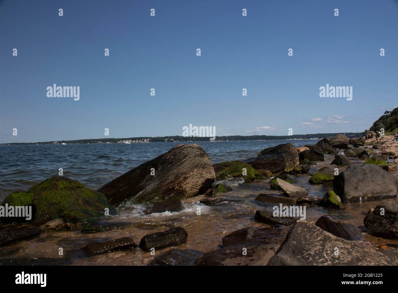 Ocean waves large rocks sand hi-res stock photography and images - Alamy