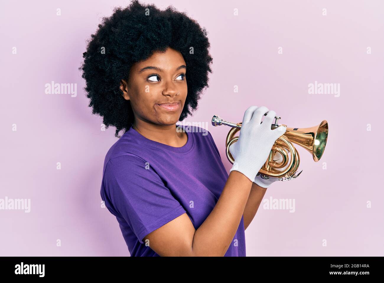 American woman playing trumpet hi-res stock photography and images - Alamy