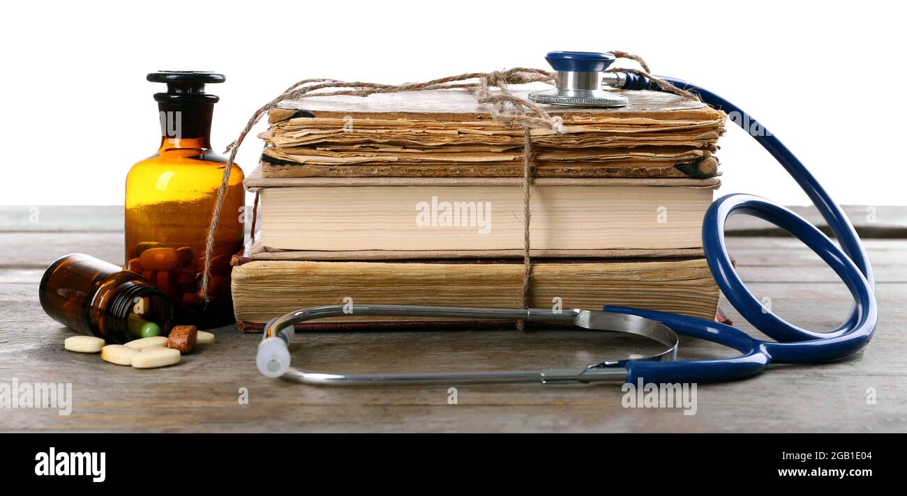 Book and stethoscope on white background Stock Photo - Alamy