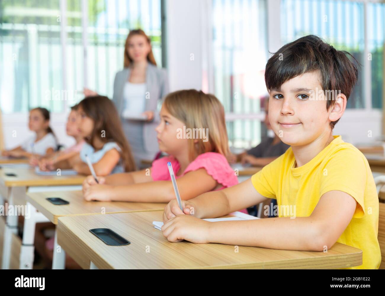 Group diligent students writing hi-res stock photography and images - Alamy