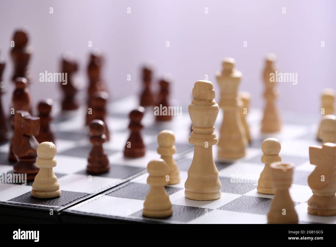 Chess pieces and game board Stock Photo - Alamy