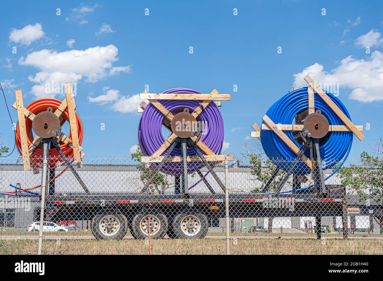Color coded underground cables on a construction site Stock Photo - Alamy