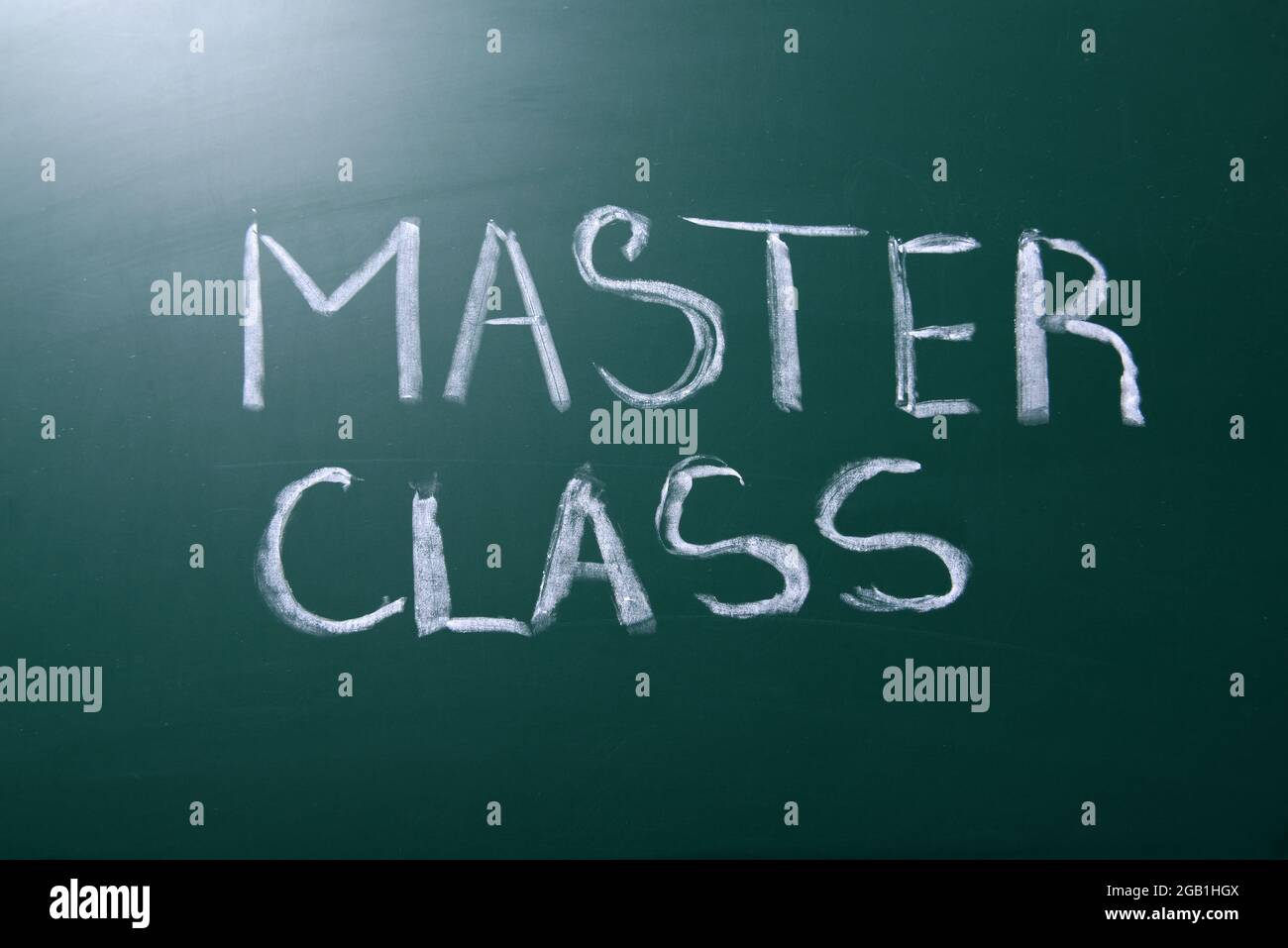 Master class inscription written with white chalk on blackboard Stock ...