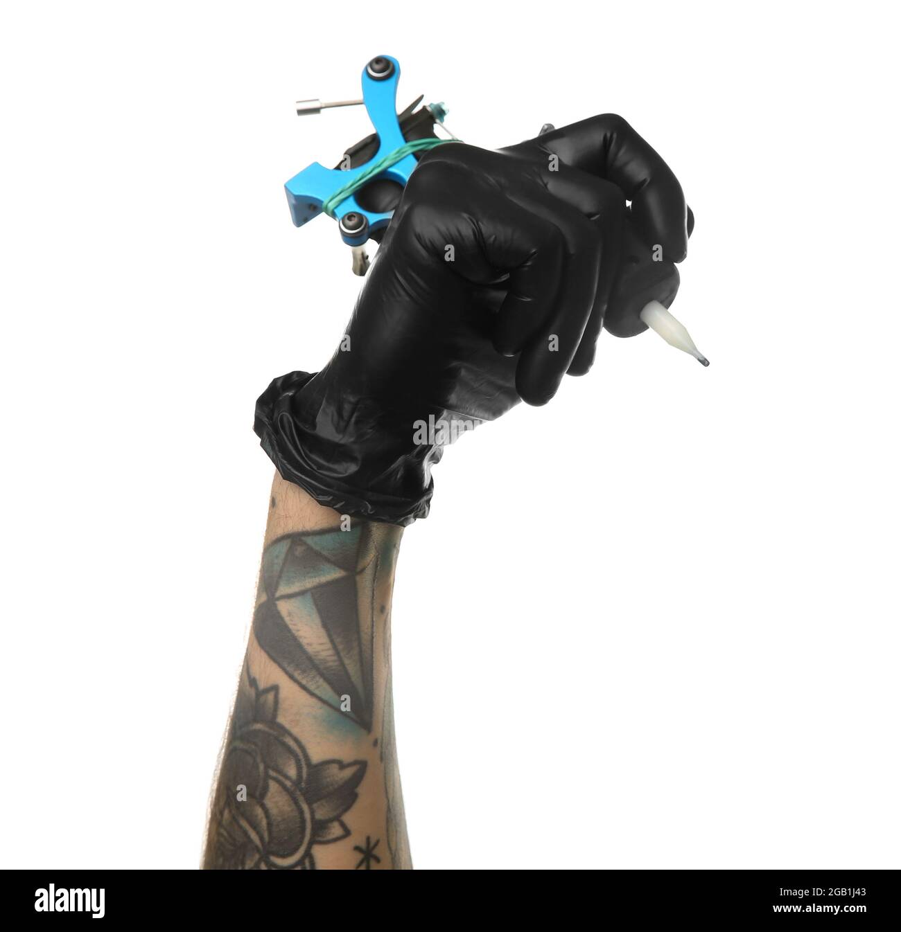 Man's hand holding tattoo machine on white background Stock Photo - Alamy