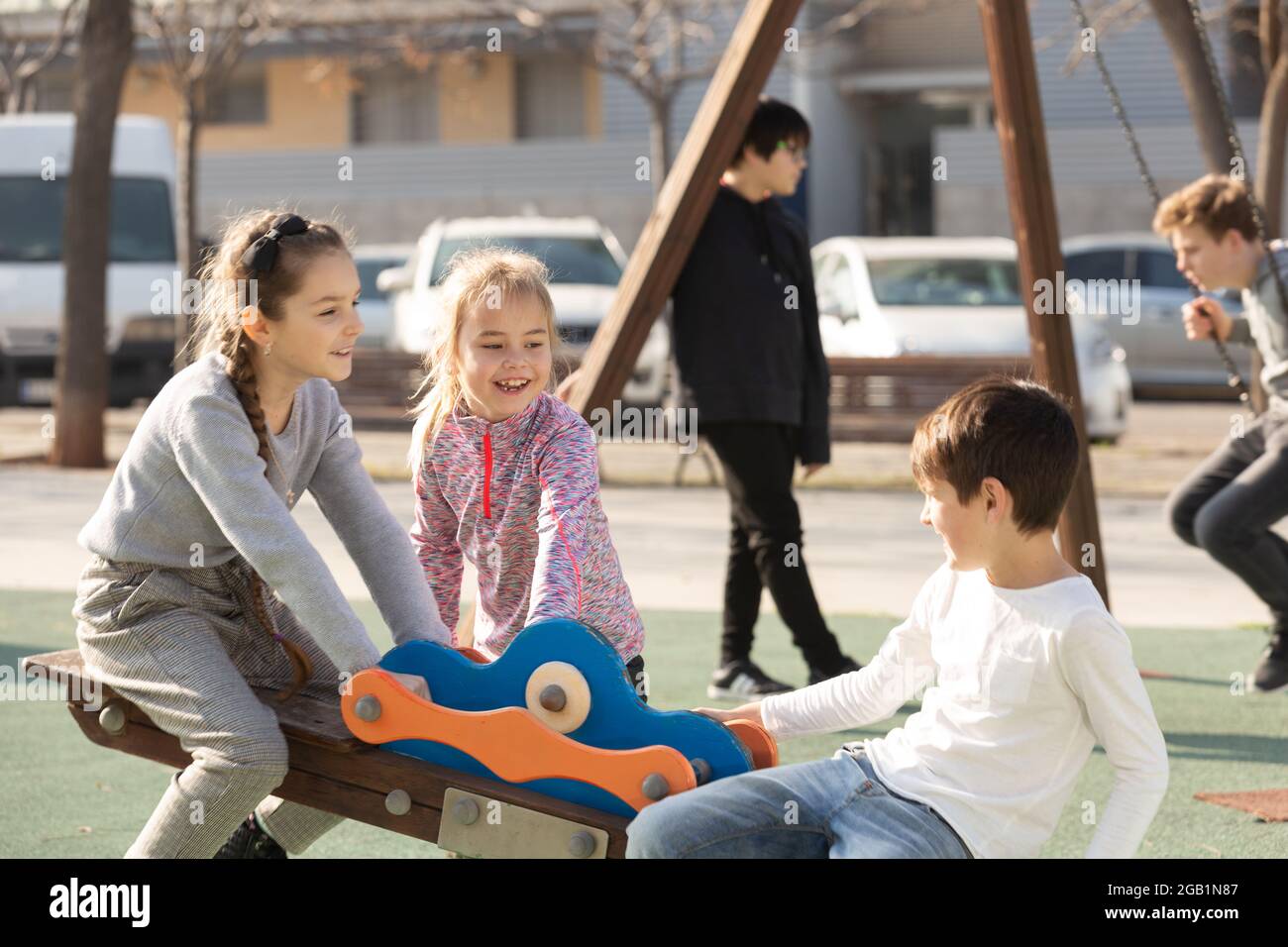 Children playing on playground Stock Photo - Alamy