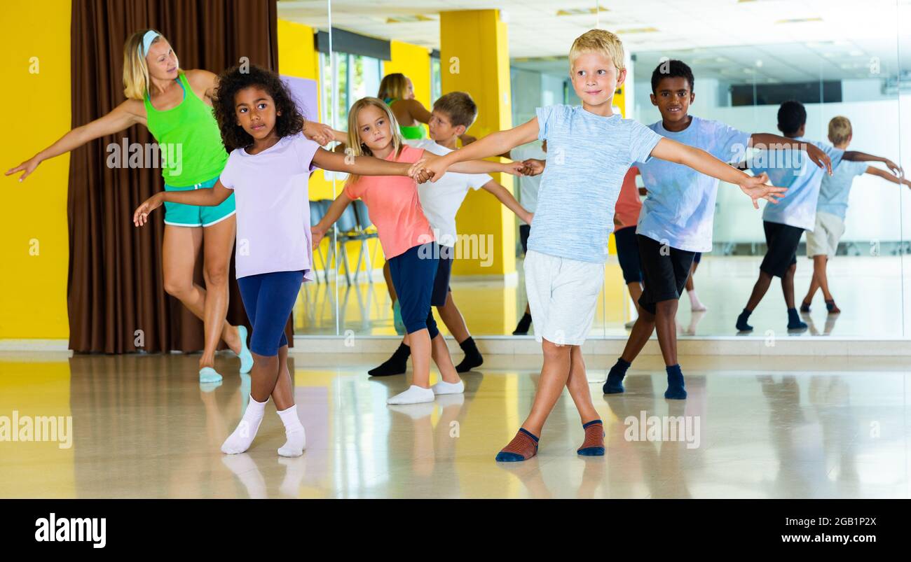 Children learn dance movements in dance class Stock Photo - Alamy