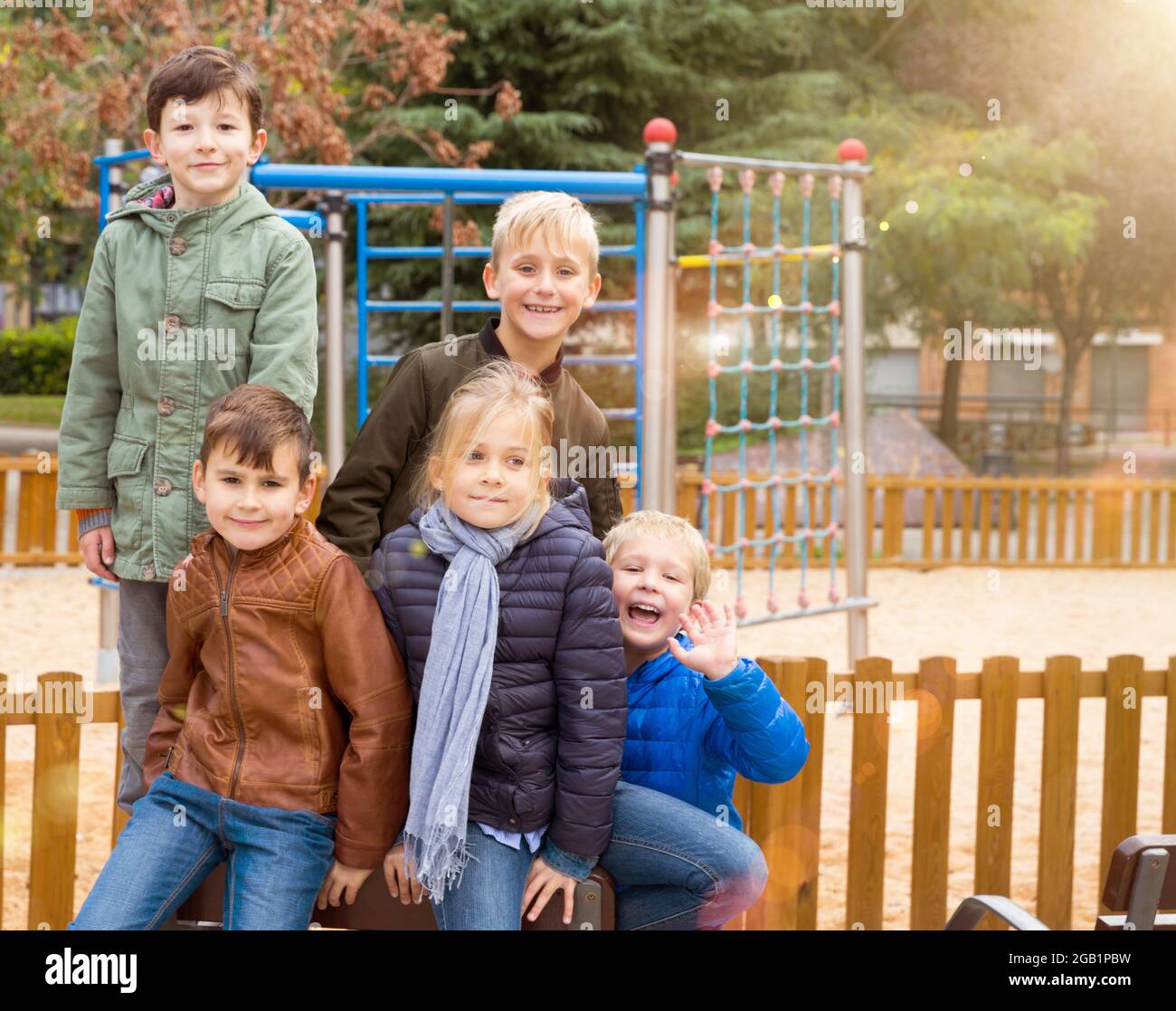 Portrait of happy kids on playground Stock Photo - Alamy