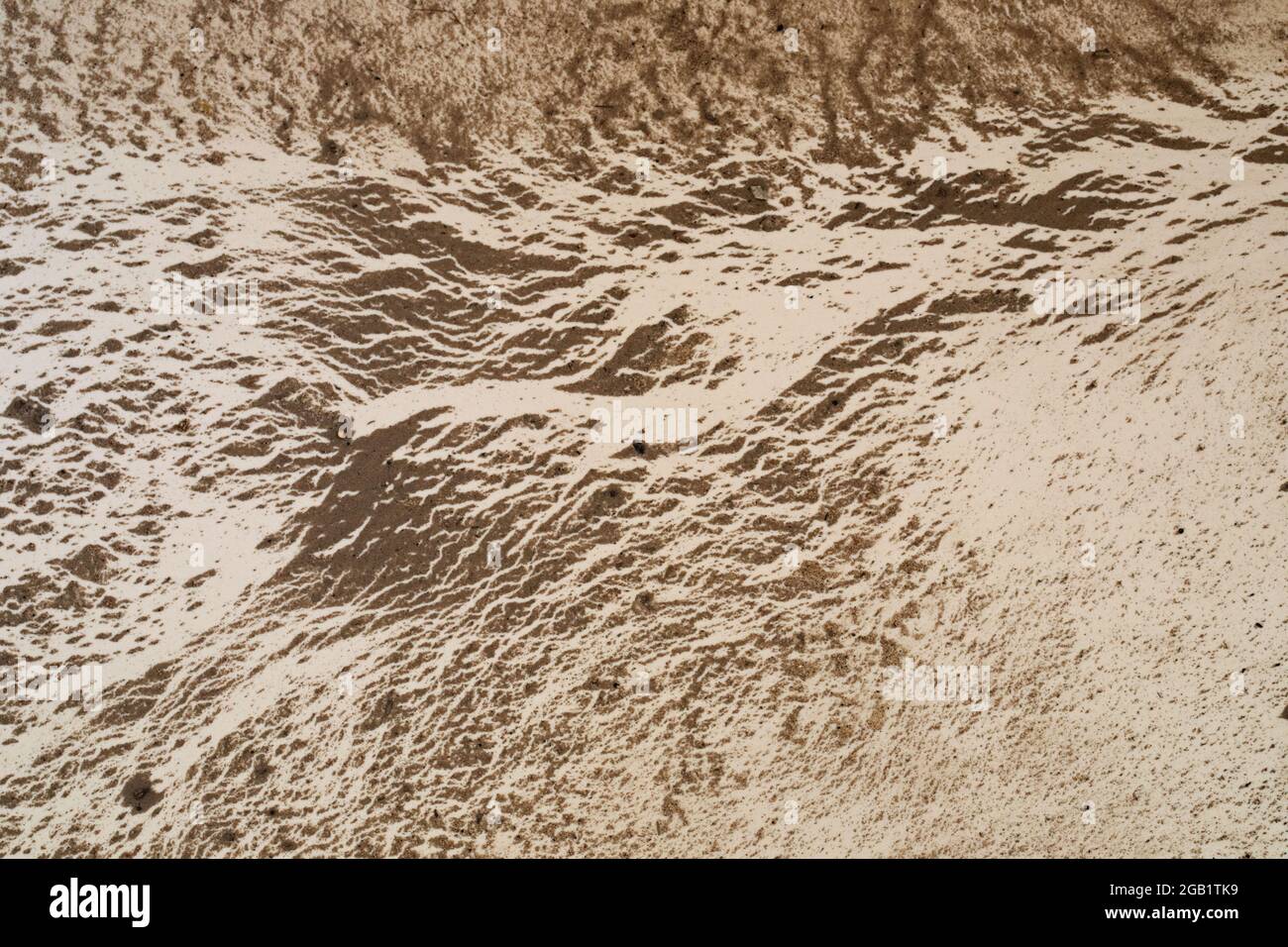 Bath, base, bottom with pattern of dirt, detritus, sand, grit leaving ...