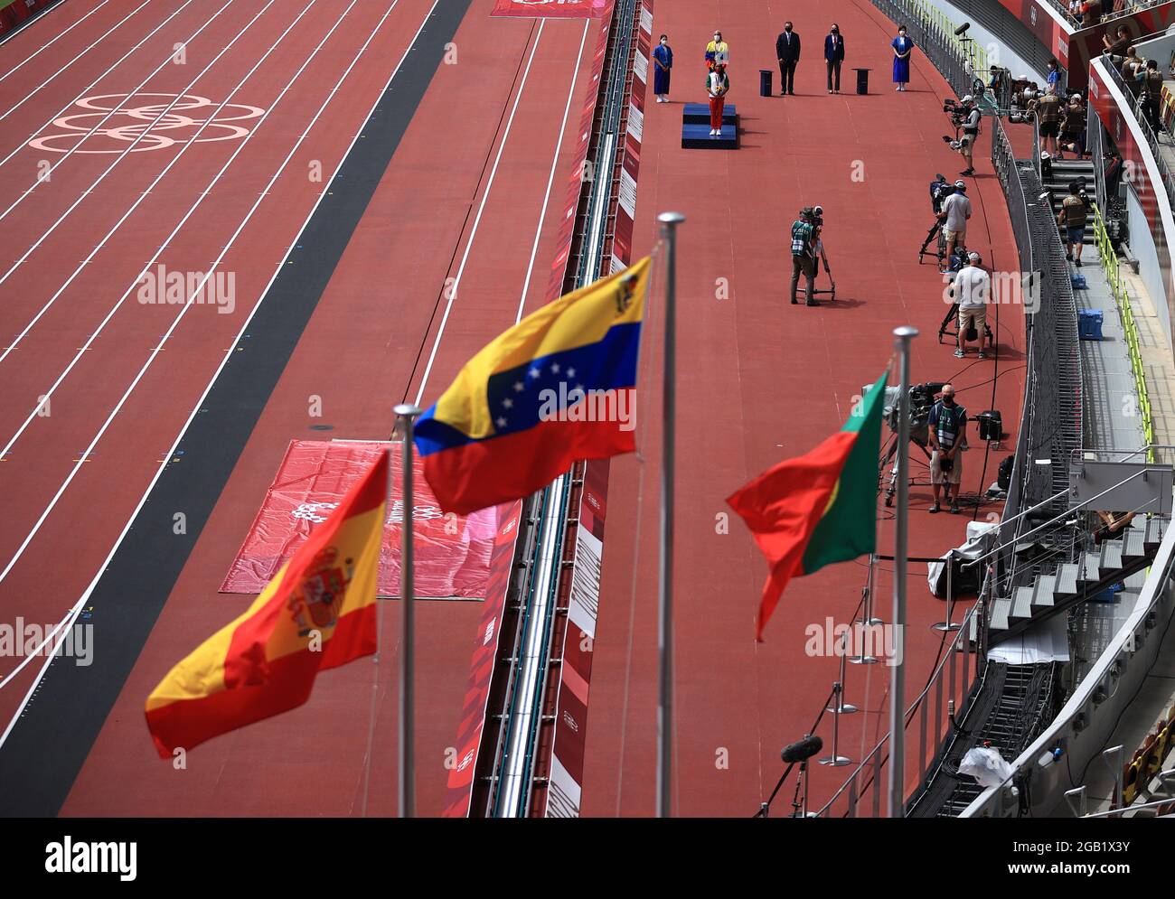 Olympic medal ceremony with flags hi-res stock photography and images ...